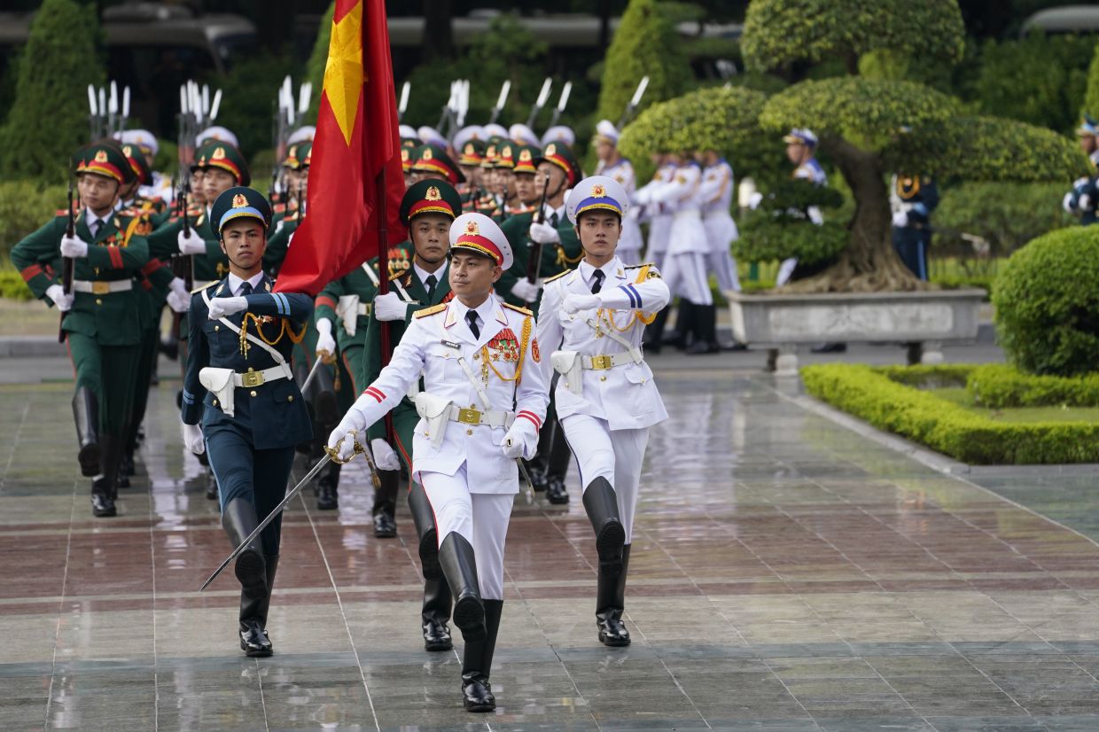Biden arrives in Vietnam to expand ties and hails 'greater era of ...