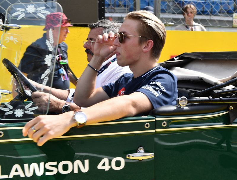 Motorsport: Motor racing-Lawson says he will not settle for less than ...