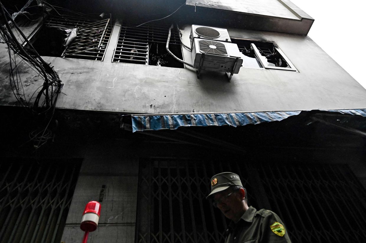 Witnesses say victims of a Hanoi high-rise fire jumped from upper ...