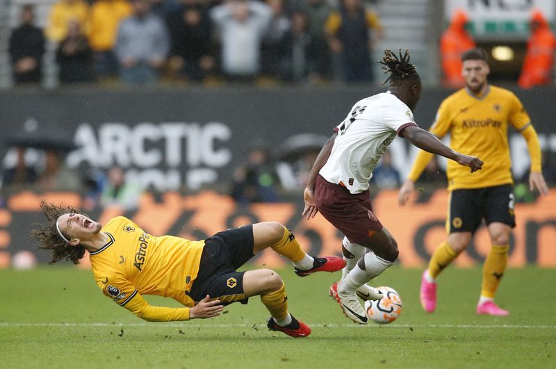 Football: Soccer-Wolves end Man City's perfect start with shock win ...