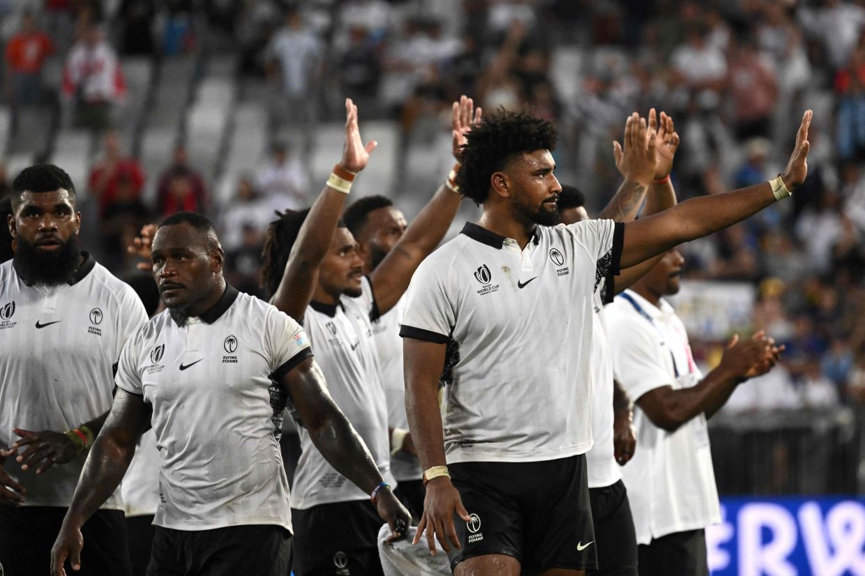 Unconvincing Fiji target keeps last eight dream alive at Rugby World ...