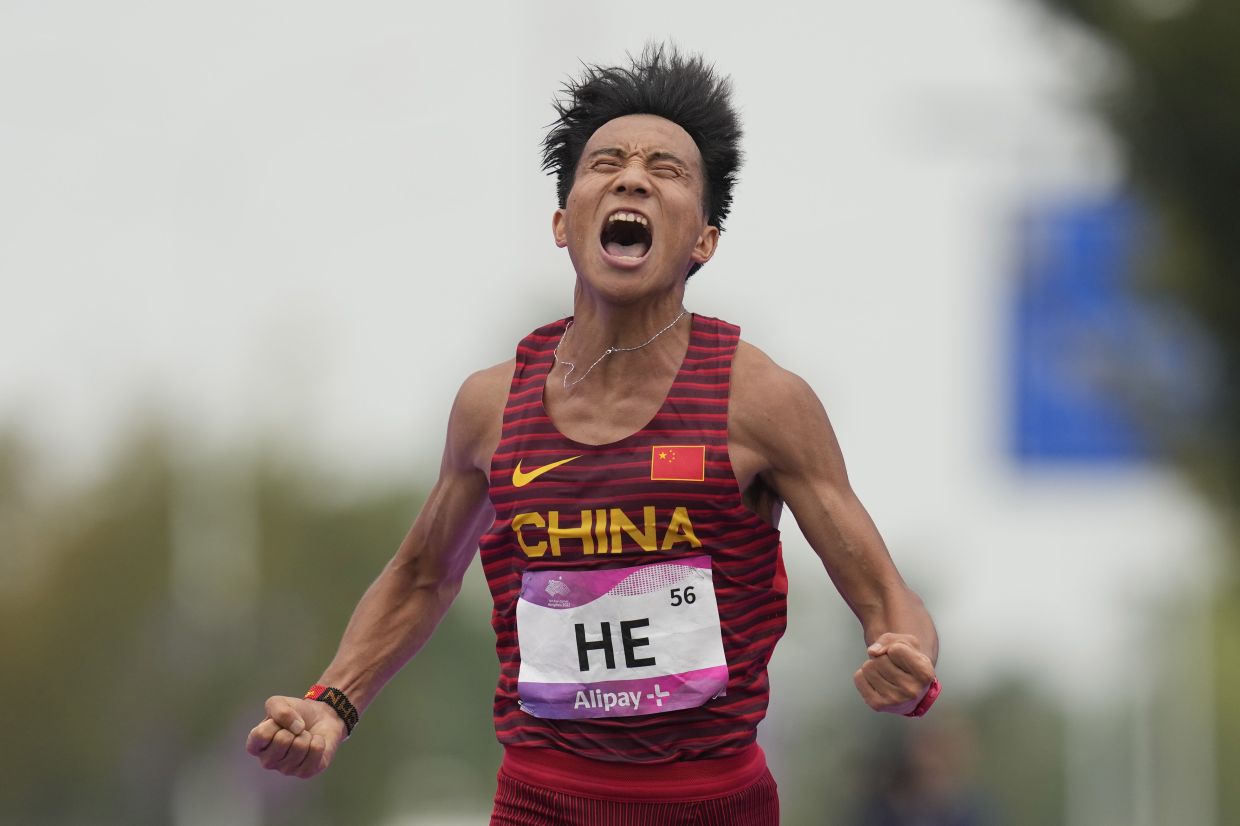 Dream comes true as China's He wins Asian Games marathon; Bahrain ...