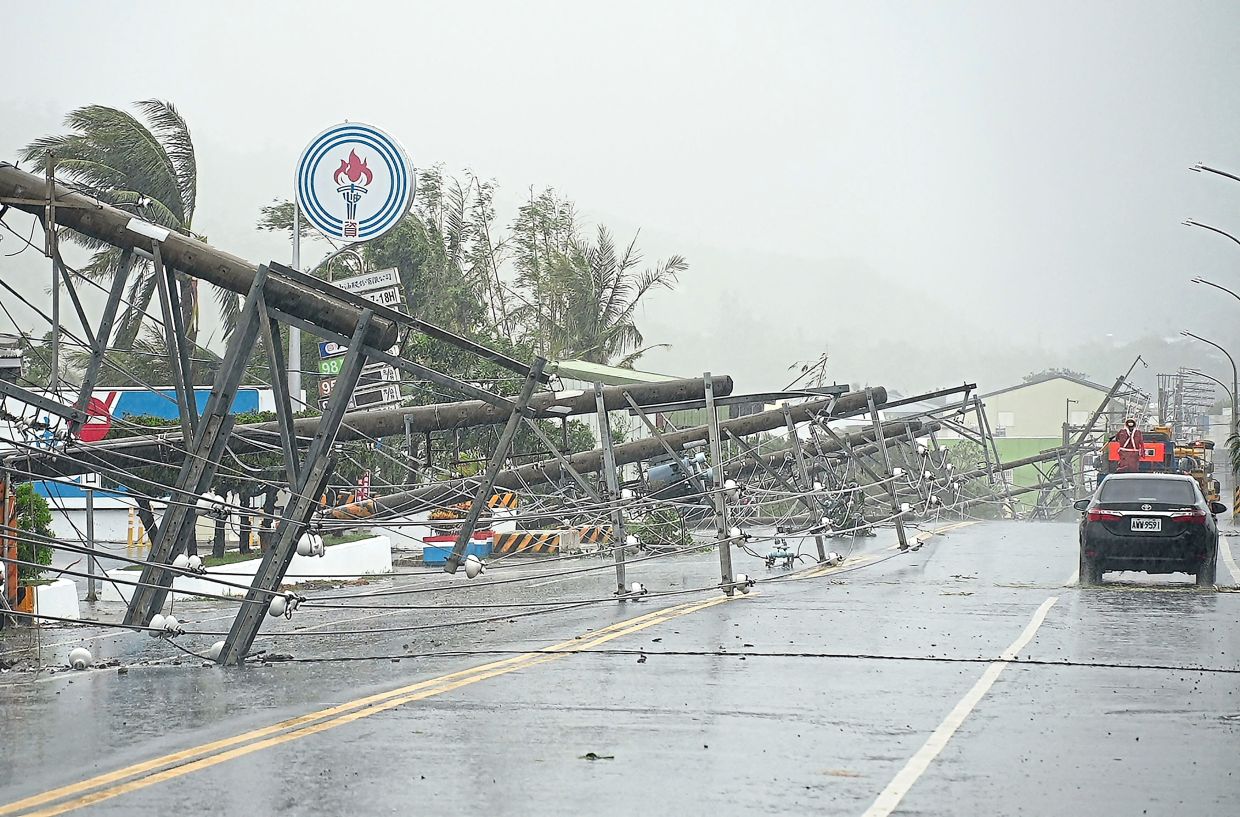Typhoon brushes past Taiwan with lashing rain | The Star