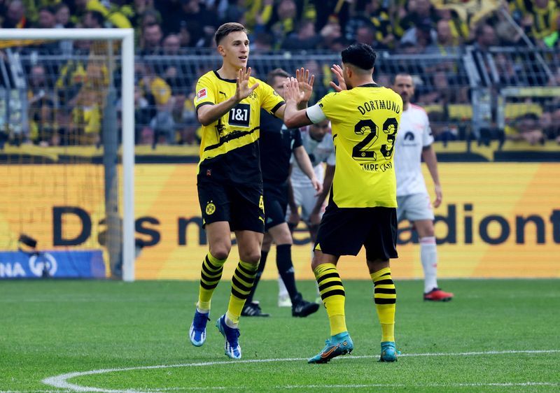 Football: Soccer-Undefeated Dortmund go second with 4-2 comeback win ...