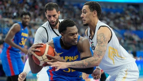Basketball players from the Philippines and Jordan, the top two teams ...