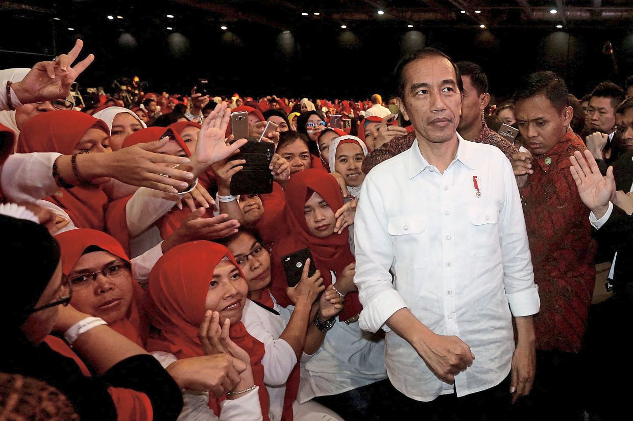 Jokowi works to keep influence after election | The Star
