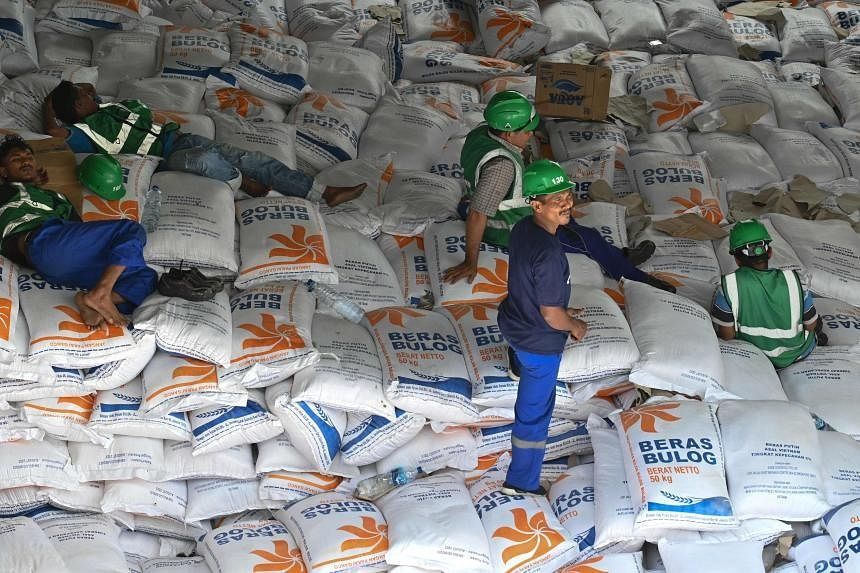 Indonesians adapt to soaring rice prices with smaller portions on ...