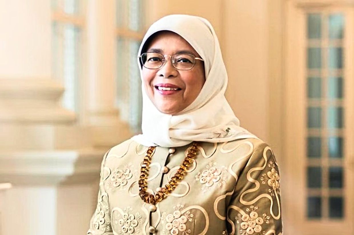 Ex-president gets honoured - Halimah conferred island state’s highest ...