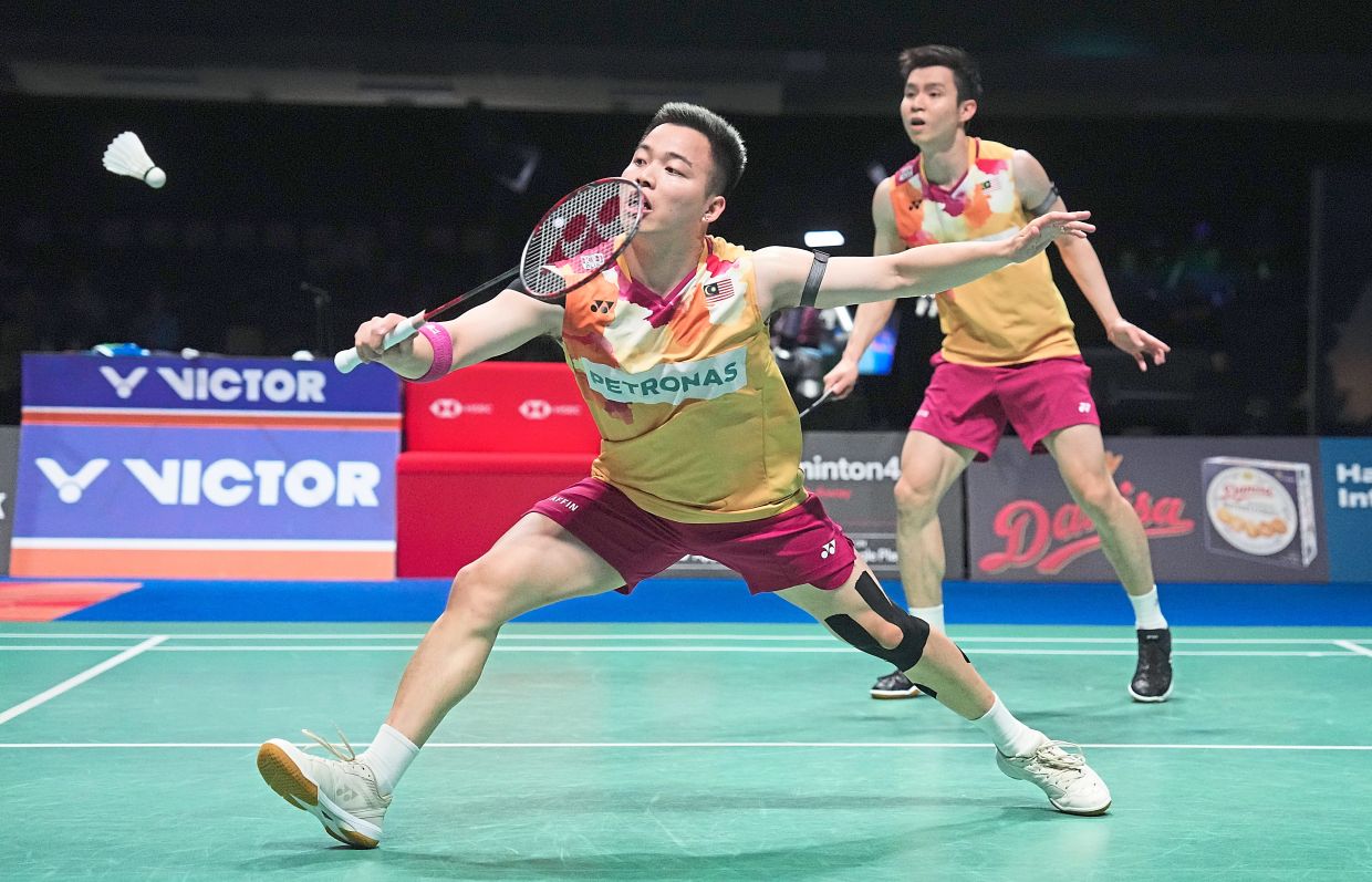 Badminton: Aaron-Wooi Yik make it clear to Yew Sin-Ee Yi who’s No. 1 ...