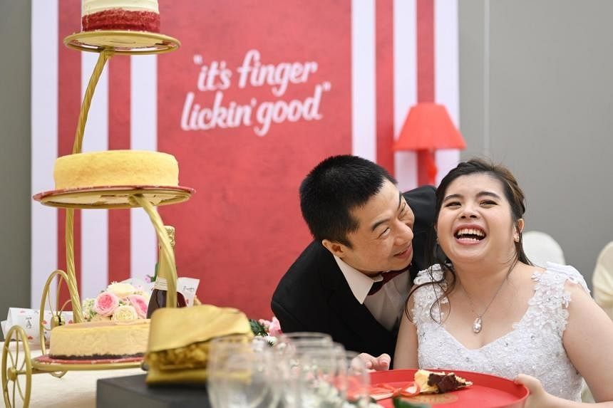 From bouquet to buffet: Couple serve up KFC-themed wedding | The Star