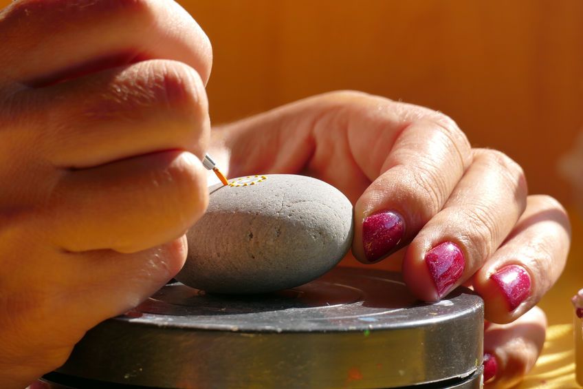 Painted rocks turn wind phone booth into space for communal healing ...