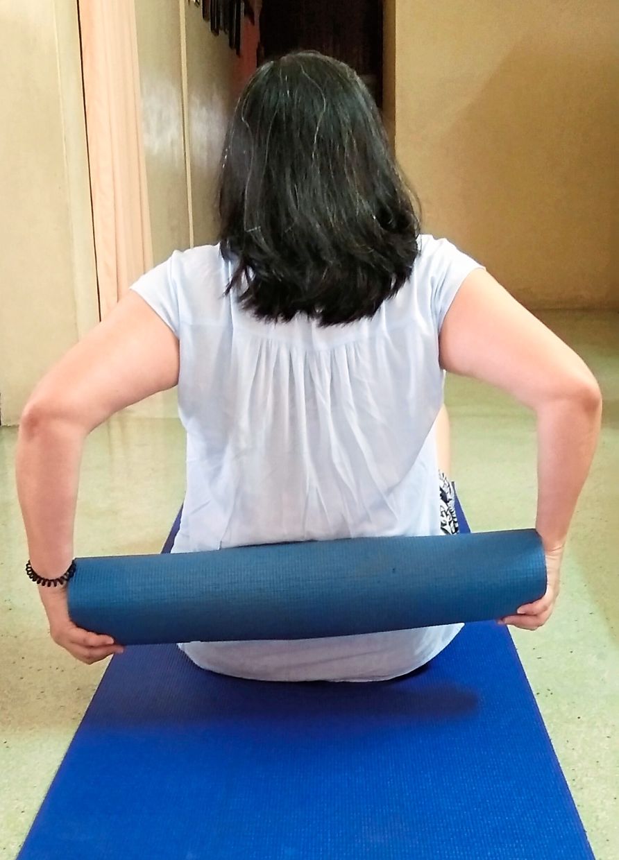 Ease those muscle aches with a rolled-up mat or towel | The Star