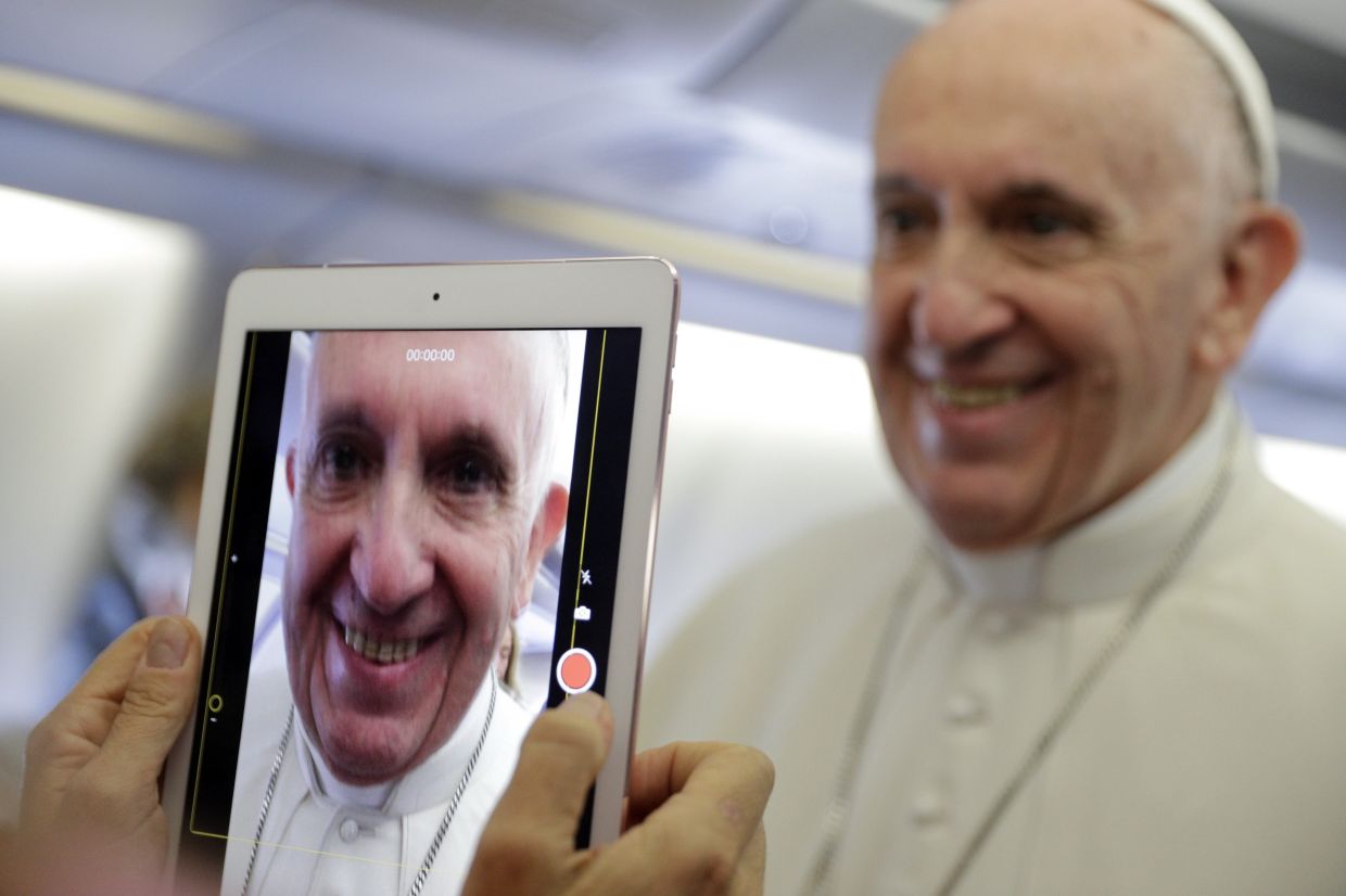 Pope, once a victim of AI-generated imagery, calls for treaty to ...
