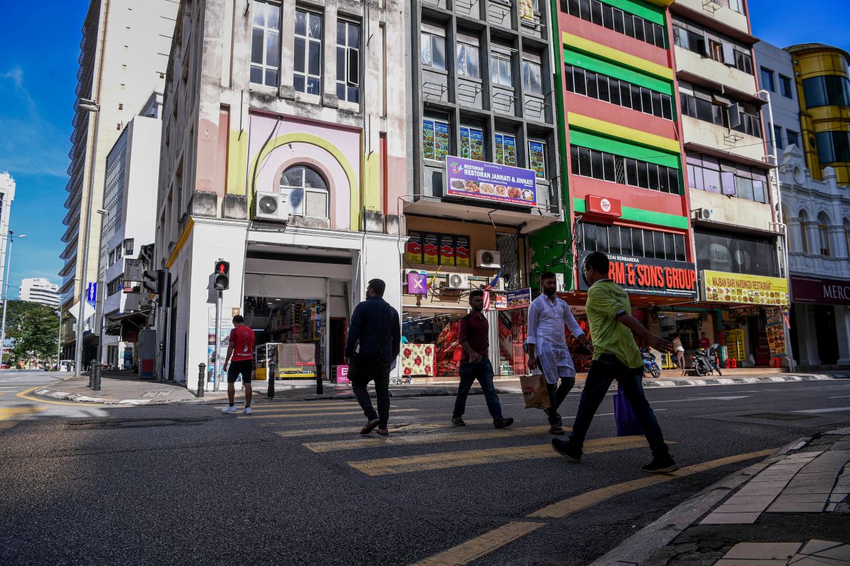 Traders call for more integrated ops in Jalan Silang migrant colony ...