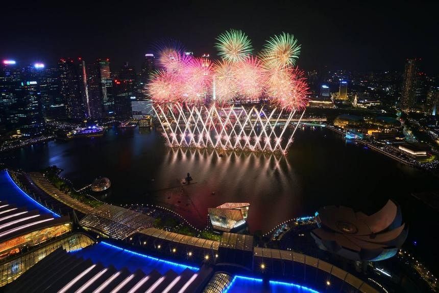 Rain in Singapore did not stop crowds from ushering in the new year at ...