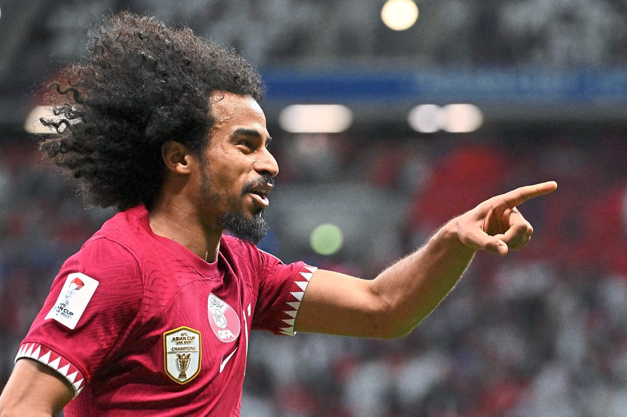 Football: Afif helps Qatar exorcise WC demons as they charge into last ...
