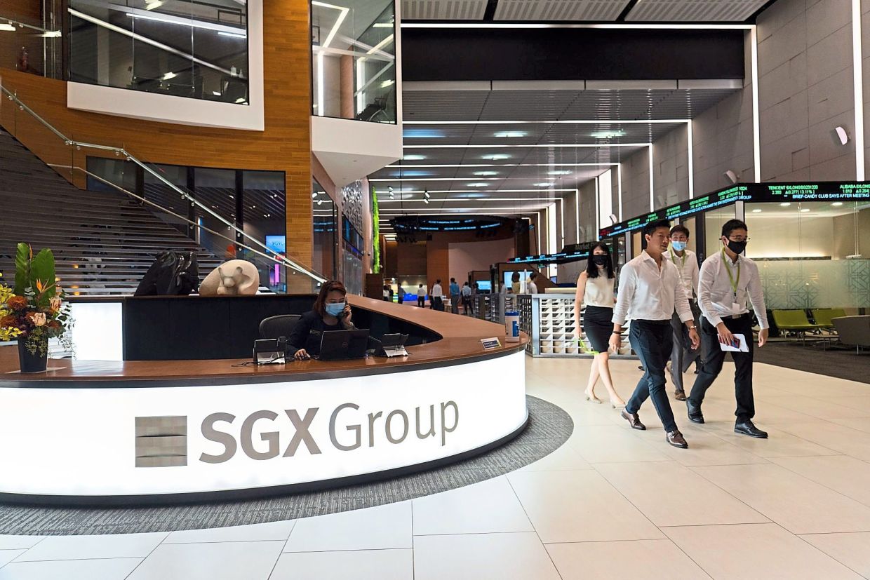 SGX net profit down 1% in the first half of FY24 | The Star
