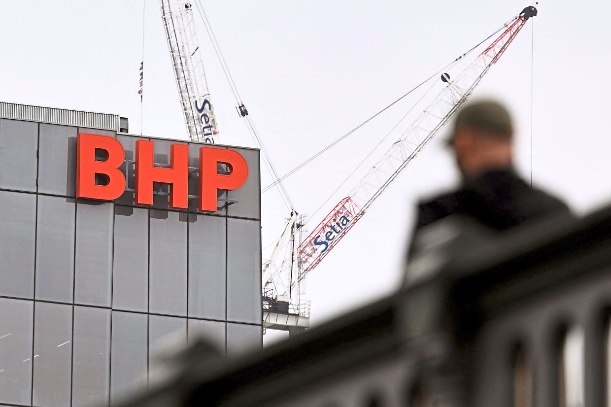 BHP flags US$5.7bil impairments on Samarco dam failure, nickel ...
