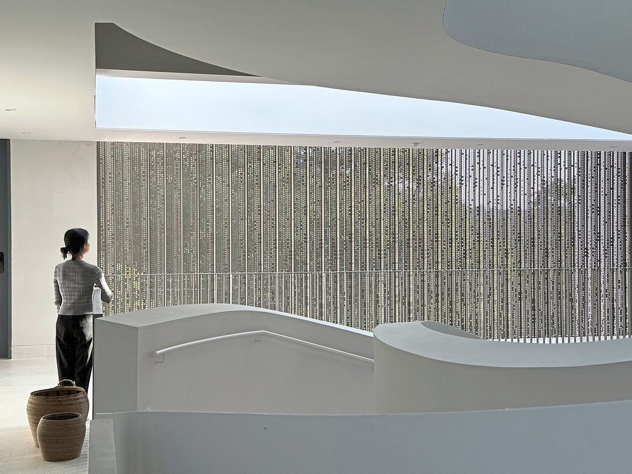 Malaysian family home in Ipoh features grand spiral staircase and inner ...