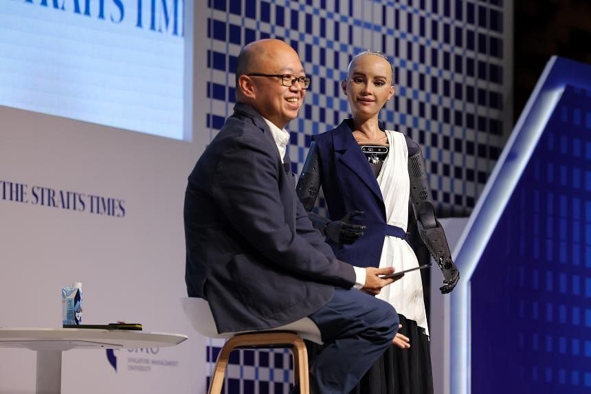 World’s first humanoid robot Sophia wows crowd at Education Forum in ...