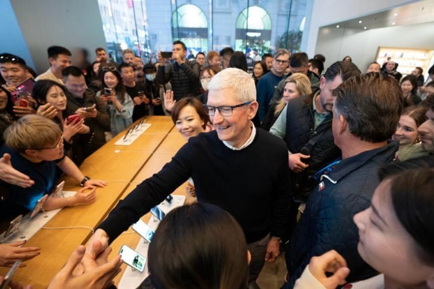 Apple CEO arrives in China touting its role as iPhone base | The Star