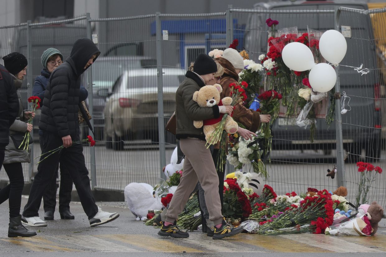 Moscow death toll from concert shooting hits 143; Russia arrests ...