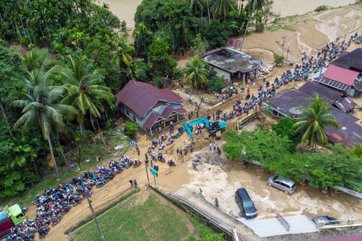 Nine missing after landslide and heavy flooding in Indonesia's Java Island | The Star