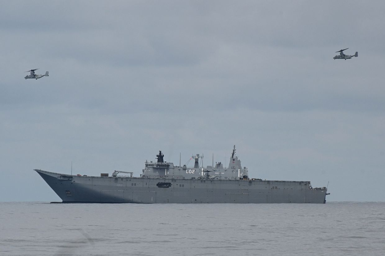 China conducts military drills in South China Sea on same day as joint ...