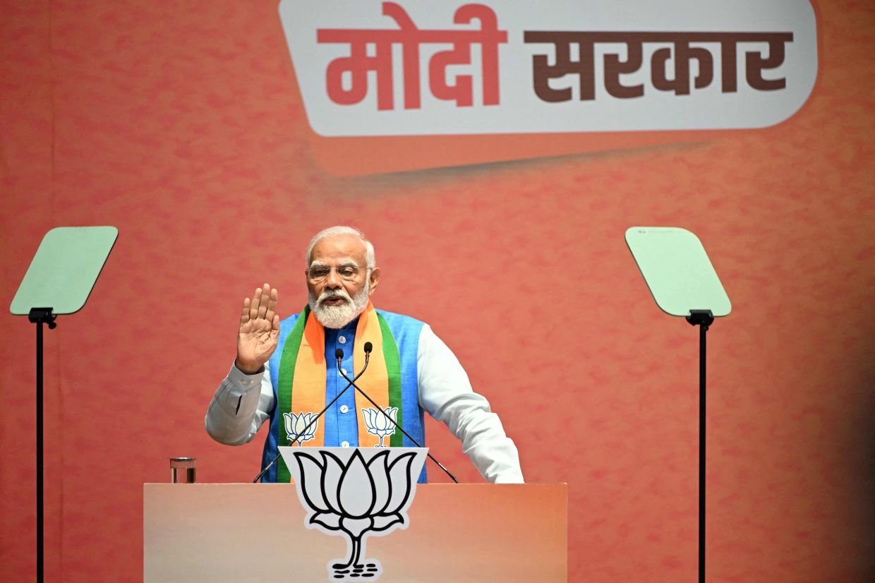 India PM Modi’s party vows continued growth and development in election ...