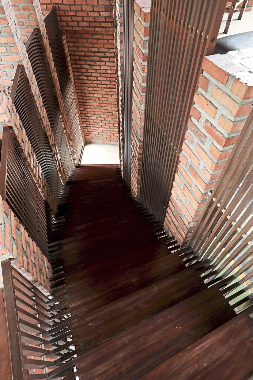 Malaysian architect's 3-storey home is inspired by traditional Malay ...