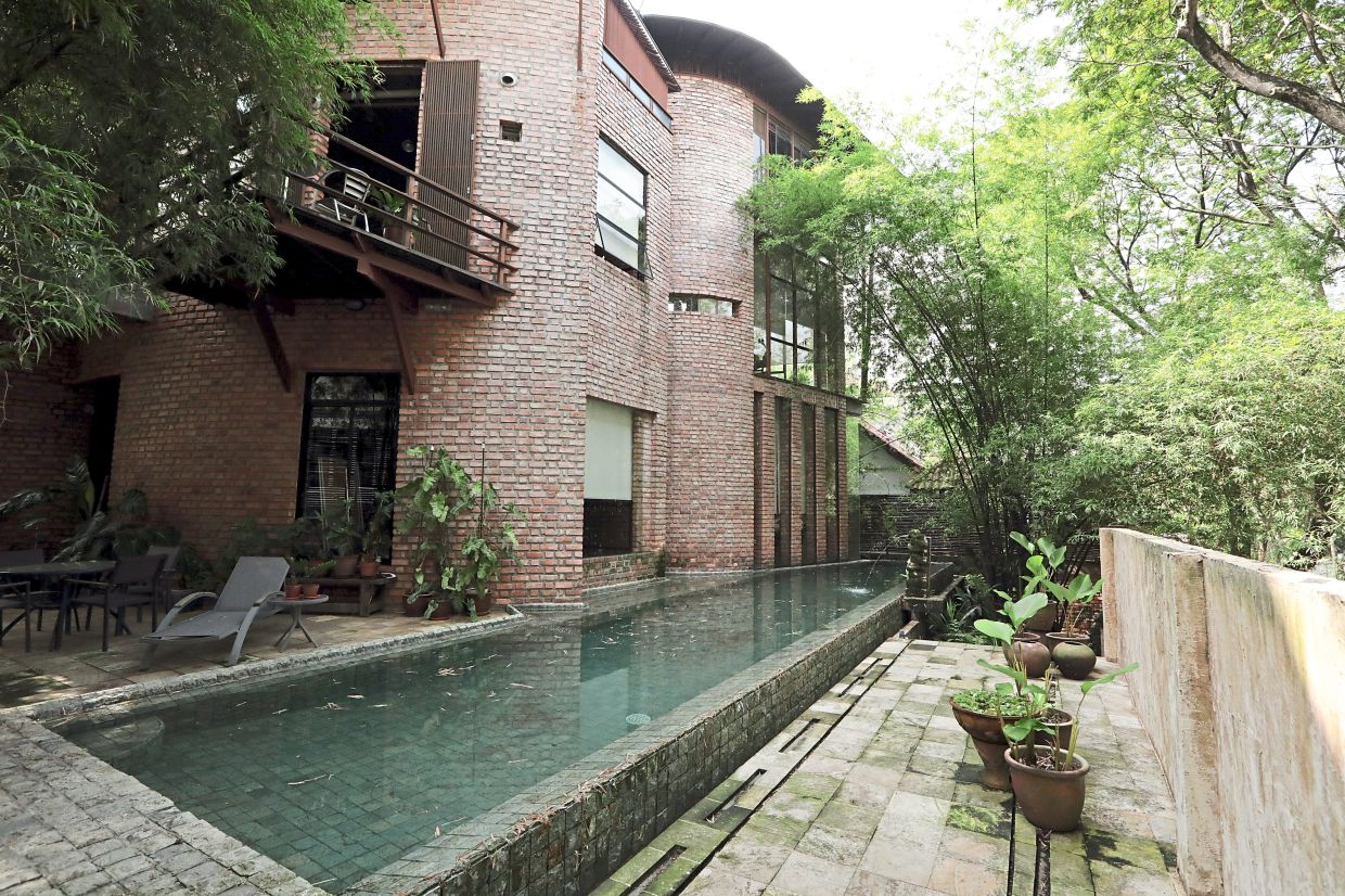 Malaysian architect's 3-storey home is inspired by traditional Malay ...