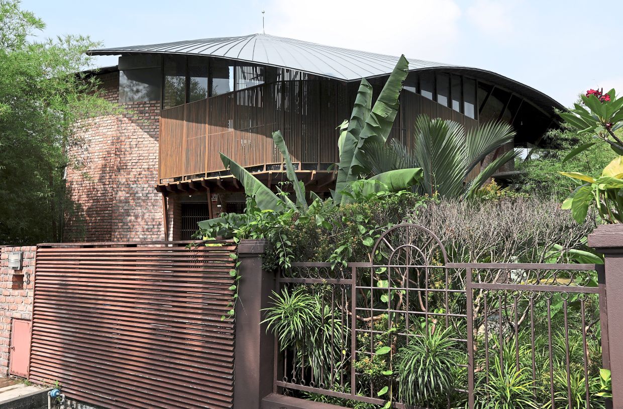Malaysian architect's 3-storey home is inspired by traditional Malay ...