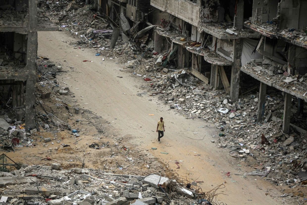 UN official says it could take 14 years or more to clear rubble from ...
