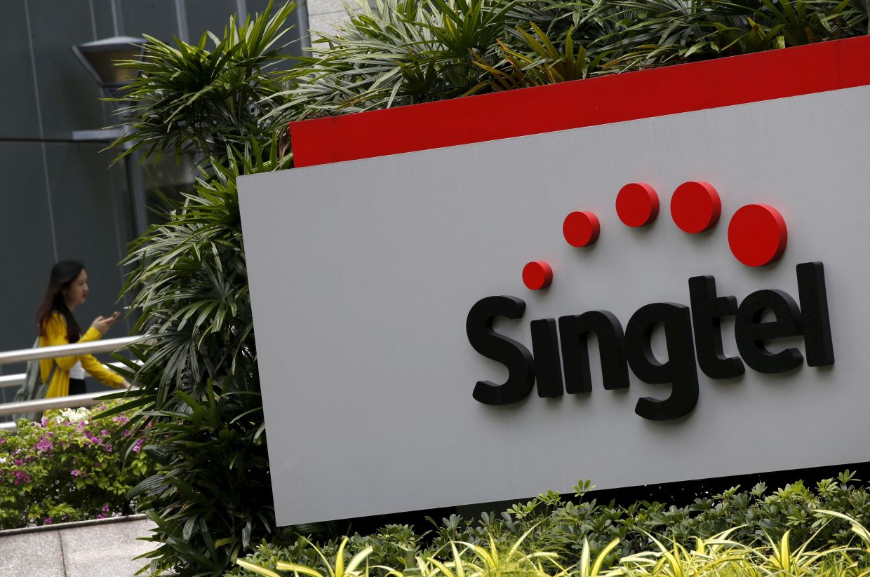 Singtel falls up to 3% after US$2.3bil impairment | The Star