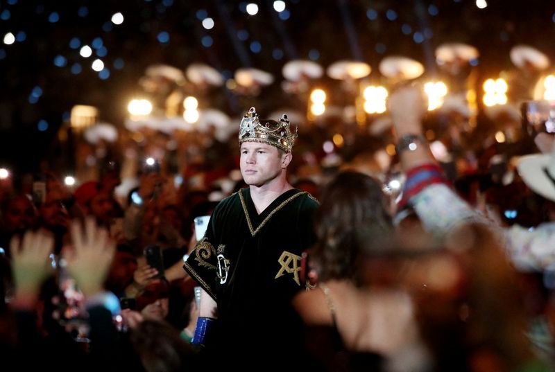 Boxing: Boxing-Alvarez retains titles with unanimous victory over ...