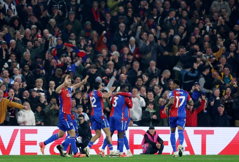 Football: Soccer-Makeshift Manchester United thumped 4-0 by Crystal ...
