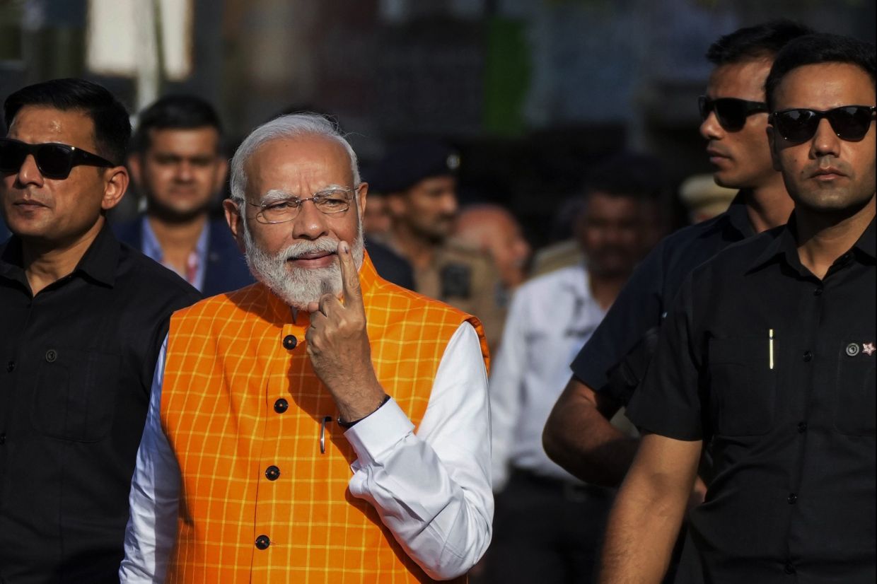 PM Modi votes as India's marathon election heats up | The Star