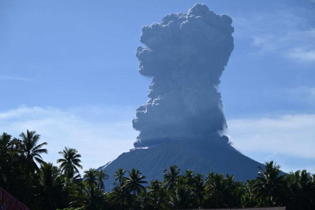 Indonesia's Mount Ibu erupts again, spews huge ash tower | The Star
