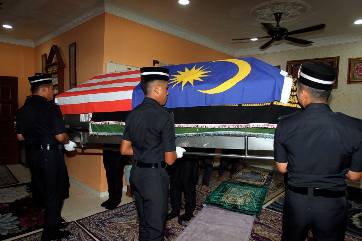 Ulu Tiram attack: Slain hero Konstabel Ahmad Azza Fahmi laid to rest | The Star