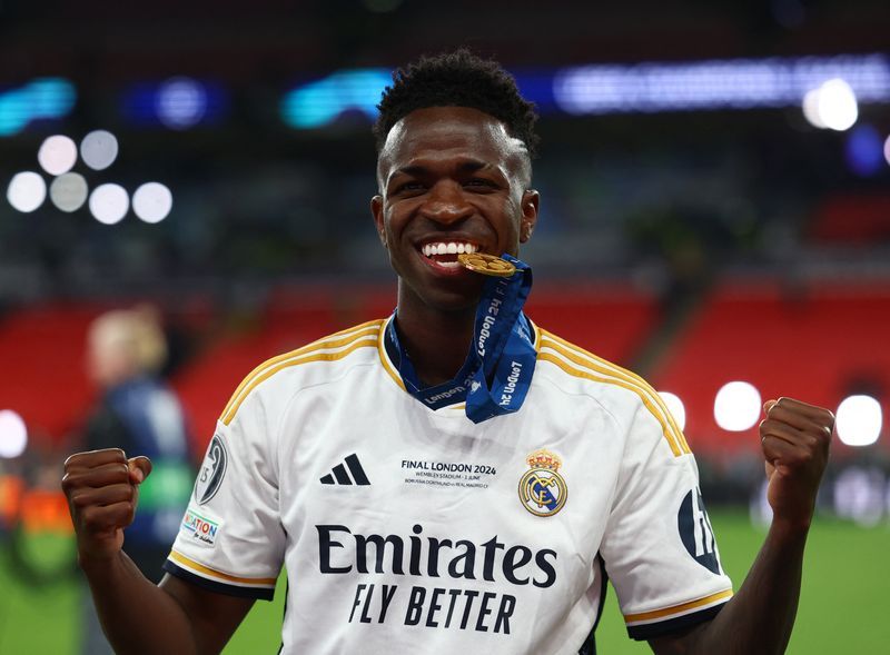 Football: Soccer-Vinicius finishes season in style to edge ahead in ...