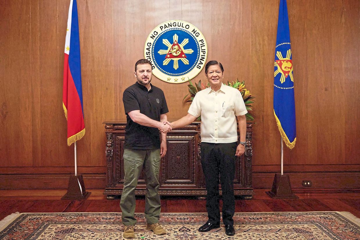 Marcos pledges support to end war | The Star