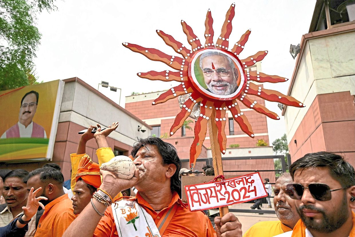 Modi heading for majority win | The Star