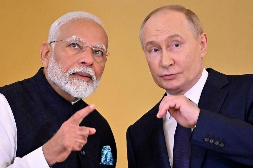 Hugs, smiles and a delicate diplomatic dance as Modi meets Putin | The Star