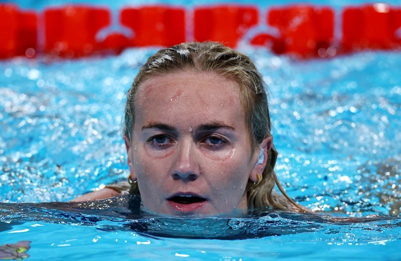Swimming: Olympics-Swimming-Titmus defends 400m freestyle title with ...