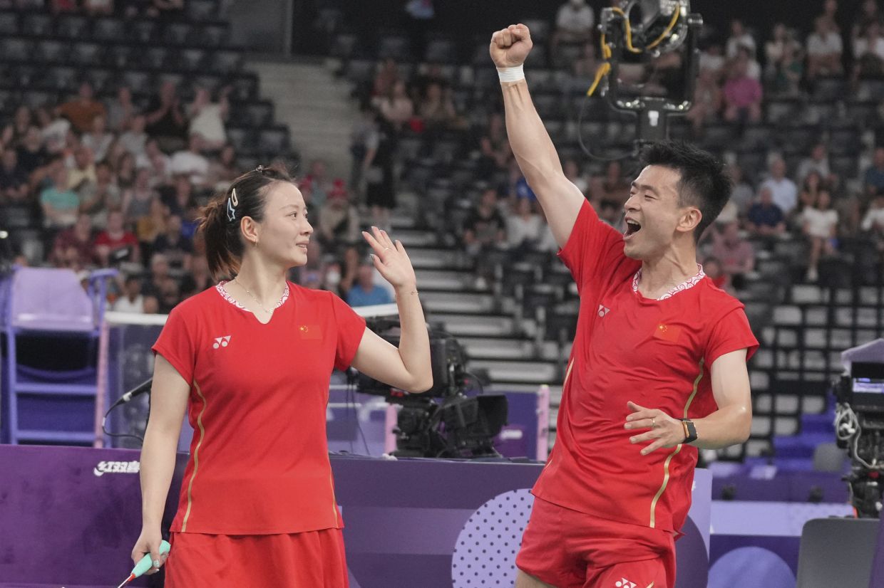 Badminton: China's Huang leaves Paris with a gold medal and a diamond ...