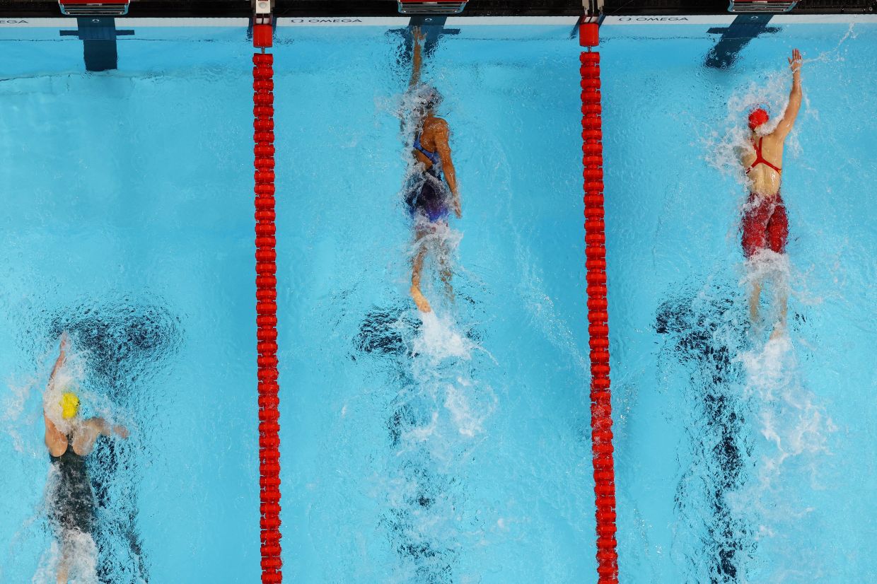 Swimming: Olympics-Choppy waters as swimming moves slowly towards ...
