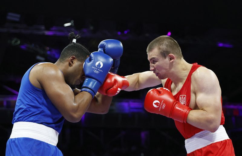 Boxing: Olympics-Boxing-Ukrainian Khyzniak ends Cuban Lopez Cardona's ...