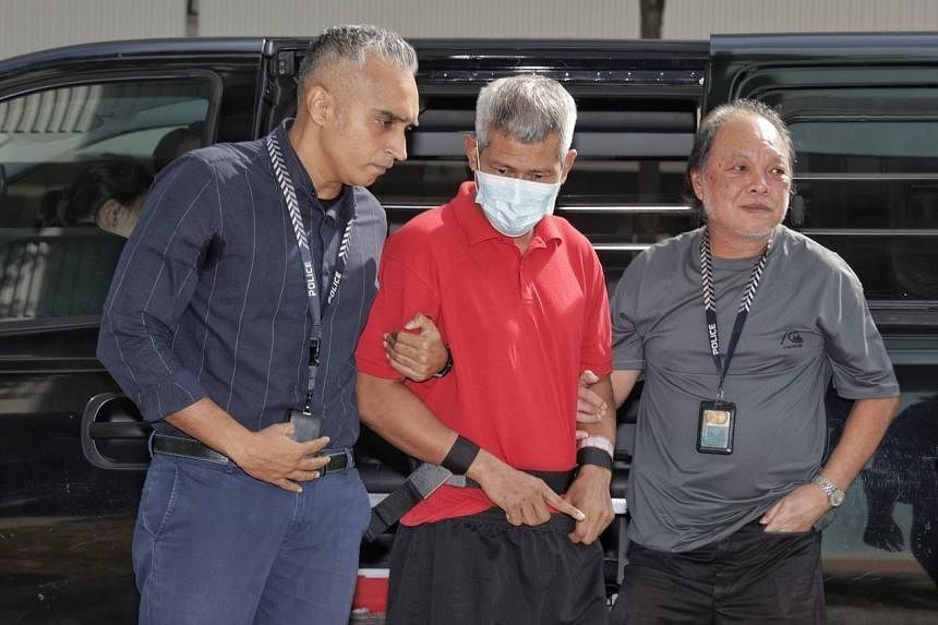 Accused in Yishun murder case escorted back to scene where body was ...