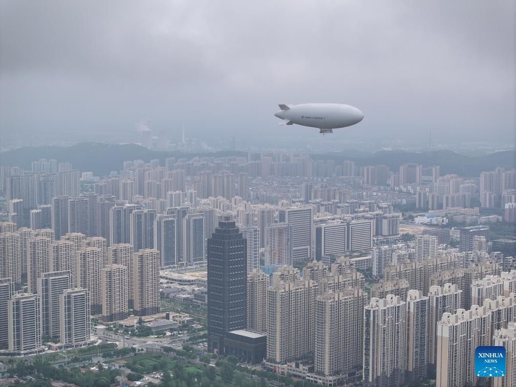 China's AS700 manned airship makes first trans-provincial ferry flight ...