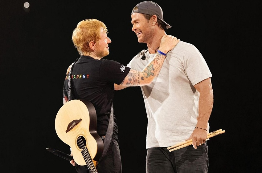 Thor actor Chris Hemsworth plays the drums at Ed Sheeran’s concert ...